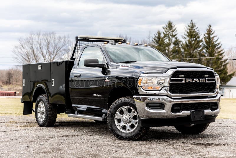Black Ram Truck Parked on a Concrete Surface in a Natural Setting ...