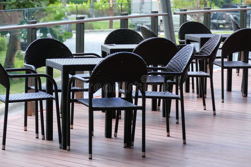 Black Rattan Table and Chair on the Terrace Stock Photo - Image of ...