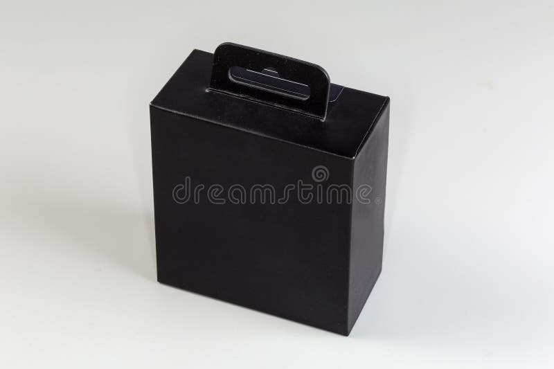 Black Rectangular Cardboard Hang Tab Packing Box on Gray Surface Stock ...