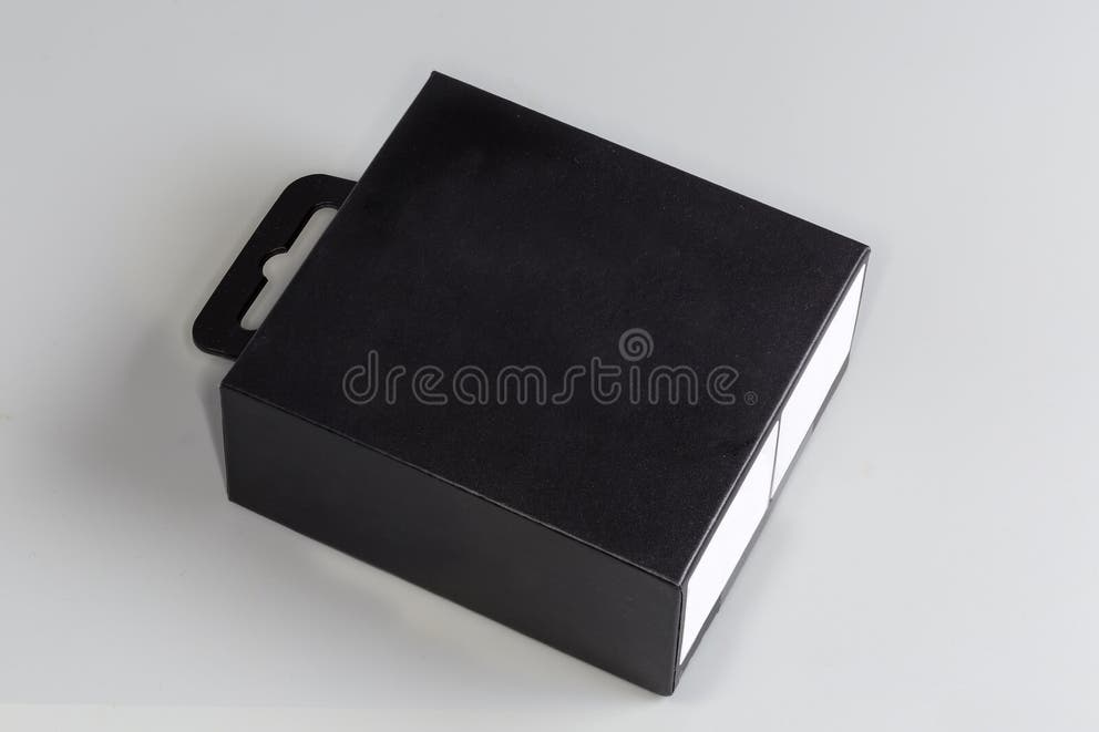 Black Rectangular Cardboard Hang Tab Packing Box on Gray Surface Stock ...