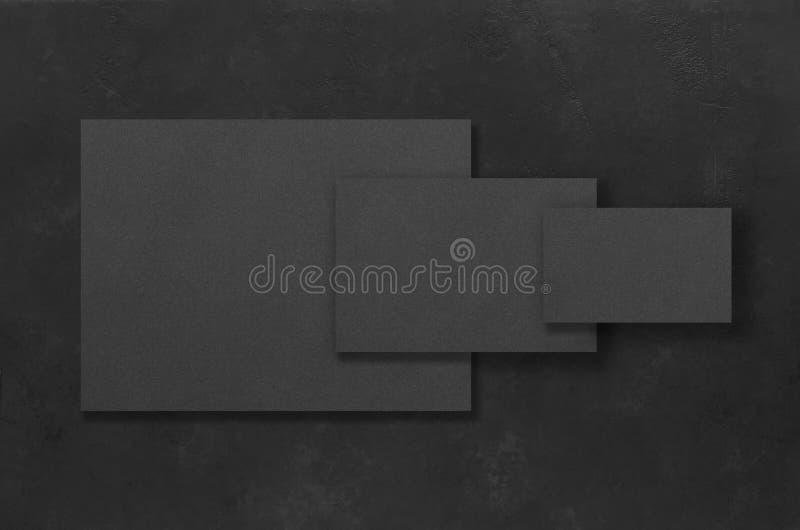 Black Rectangular Mockups on a Dark Concrete Background. Design ...