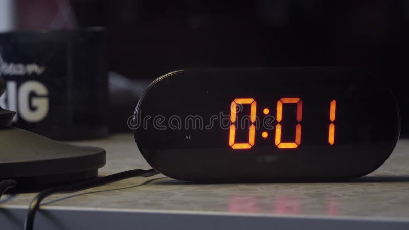 Black Rectangular Shaped Plastic Digital Clock Indicates Time in Orange ...