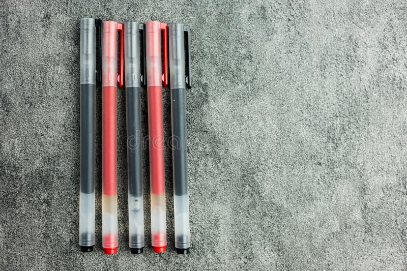 Black and red gel pens stock image. Image of container - 343626677