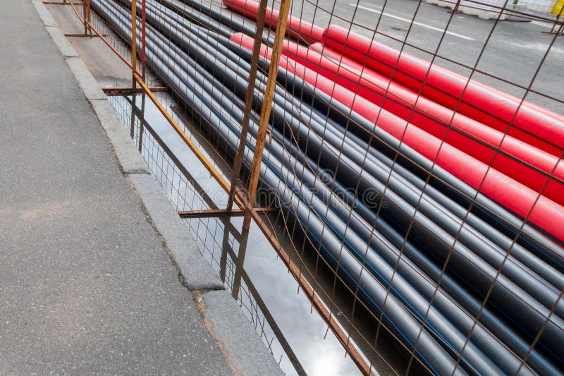 Black and Red PVC Pipes for Underground Cables and Structures at a ...