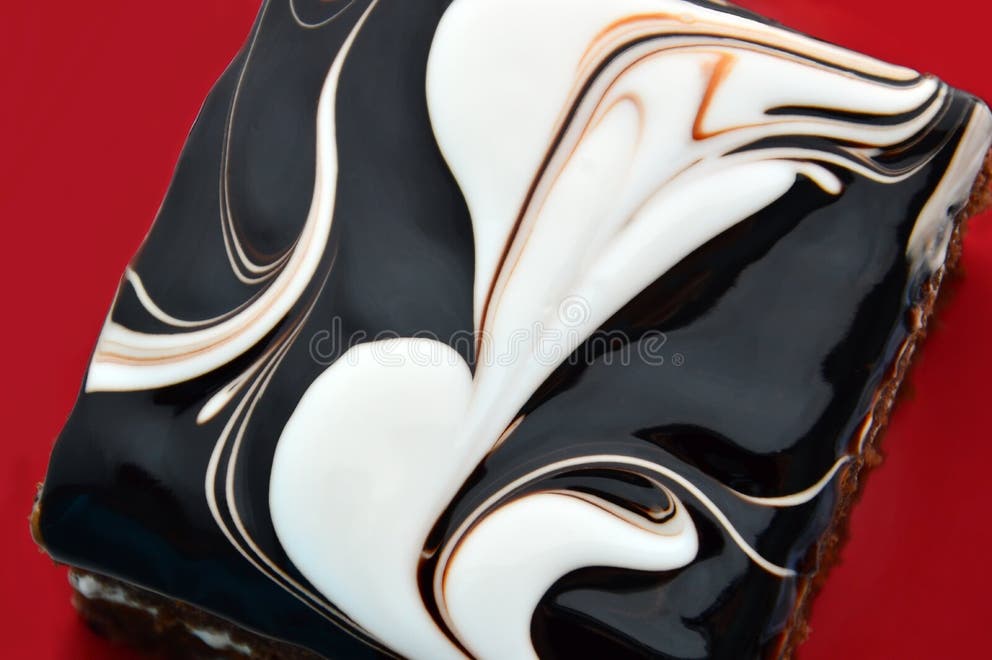 Black on Red. Square Cake with Icing on a Red Plate. Abstract. Stock ...