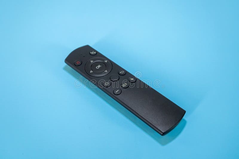 Black Remote Control on Blue Background Stock Photo - Image of object ...