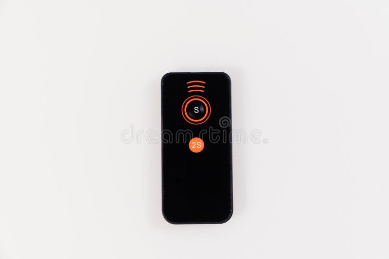 Black Remote Control for the Camera on a White Background. Stock Photo ...