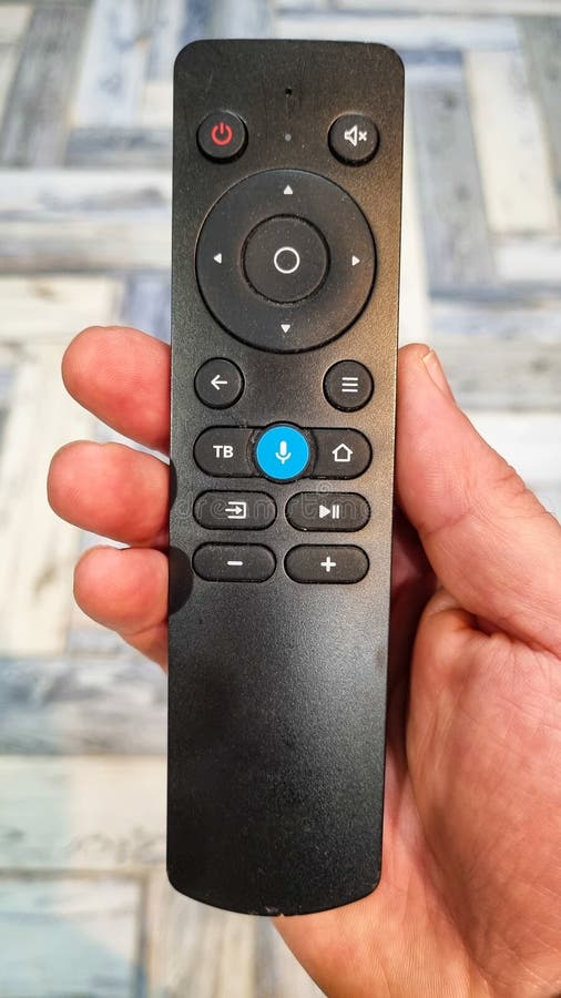 Black Remote Control for a Set-top Box in a Man& X27;s Hand. Stock ...