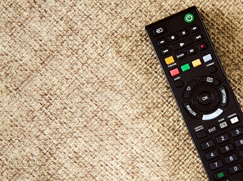 A Black Remote Control of a Television Set Stock Photo - Image of ...