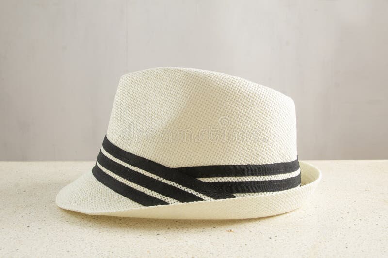Black Ribbon Straw Hat Side View on Grey Horizontal Table Stock Photo ...