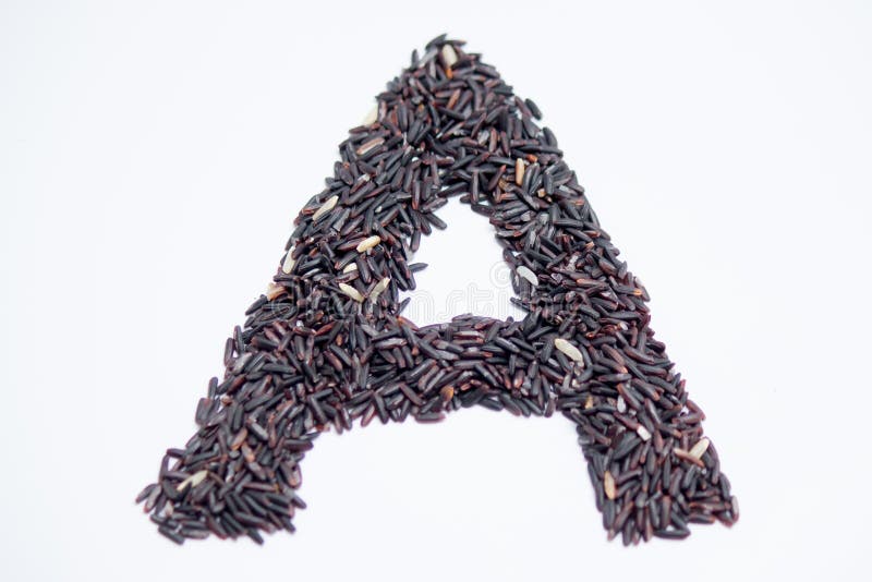 Black rice is a alphabet stock photo. Image of cereal - 122785066