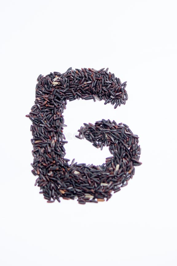 Black rice is a alphabet stock photo. Image of food - 122785408
