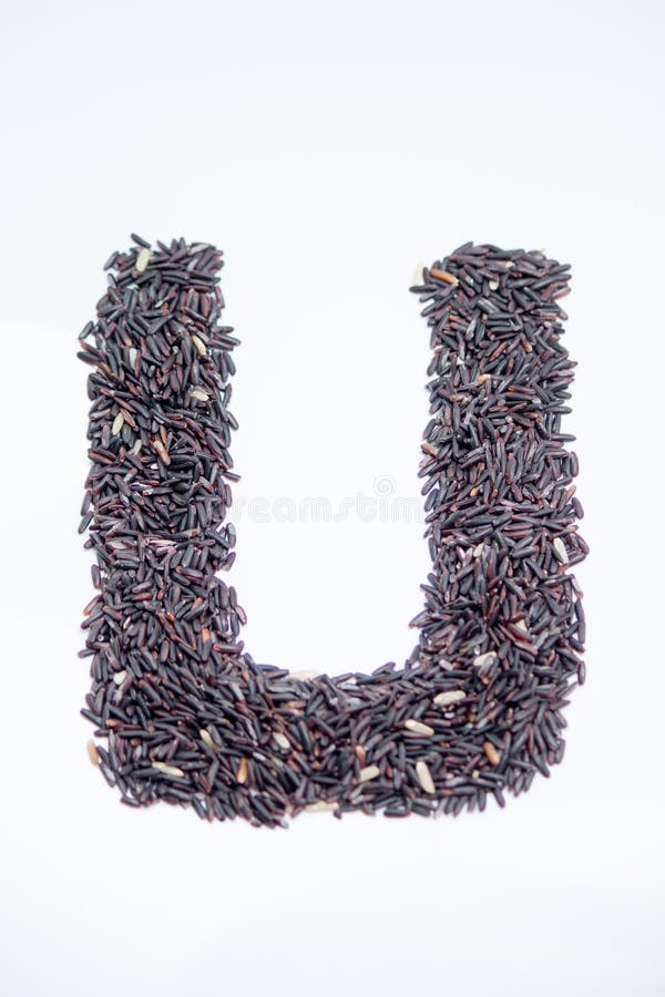 Black rice is a alphabet stock image. Image of heap - 122785891