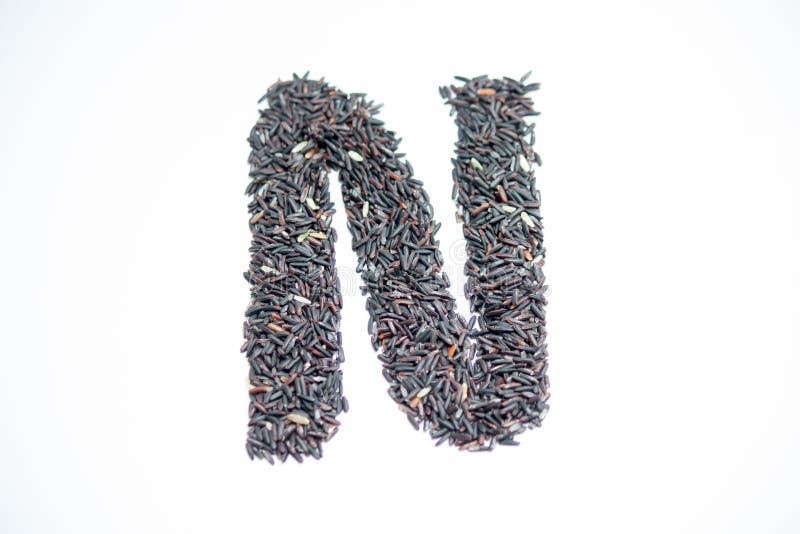 Black rice is a alphabet stock image. Image of natural - 122785543
