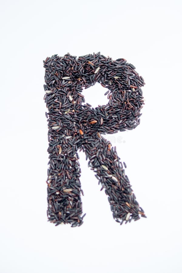 Black rice is a alphabet stock photo. Image of eating - 122785902