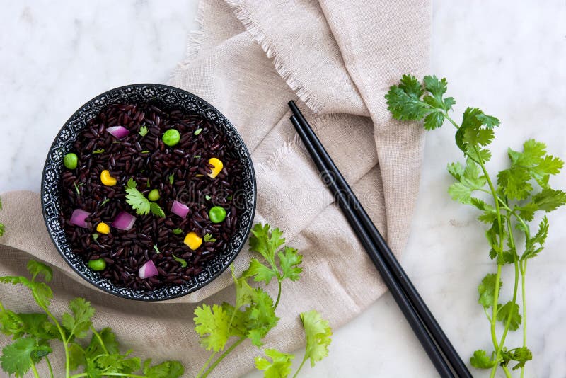 Black Rice in a Bowl and Vegetables on Marble Table Stock Photo - Image ...