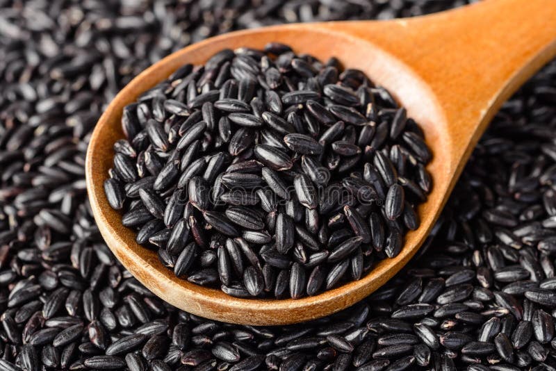 Black rice stock photo. Image of shovel, rice, heap, vegetarian - 56207304