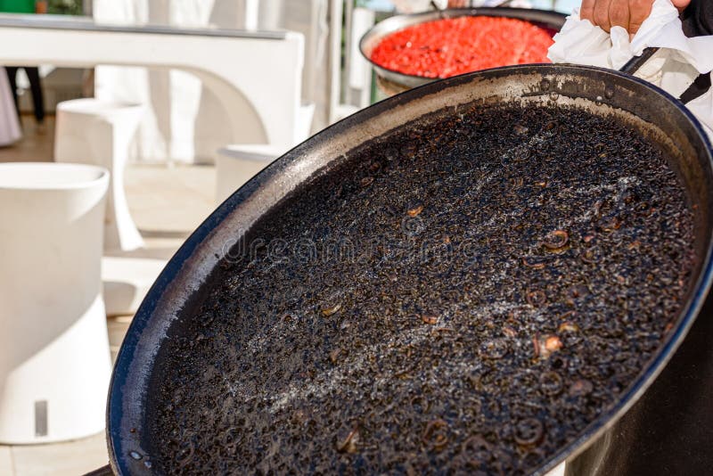 Black Rice Paella, Typical of Valencia in Spain, with Squid Ink Stock ...