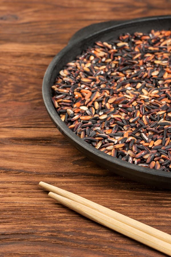 Black rice in pan stock image. Image of black, healthy - 119168725