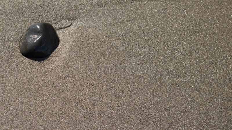 Black Rock on the Beach stock image. Image of alone - 188733765