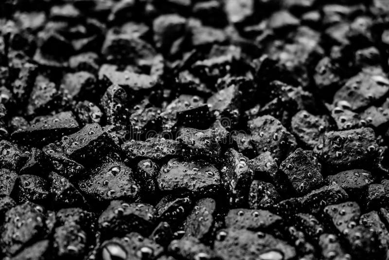 Black Rocks with Spots of Water Stock Image - Image of font, adult ...