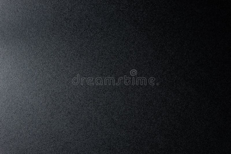 Black, Rough Textured Background Lit with Dim Light. Stock Image ...