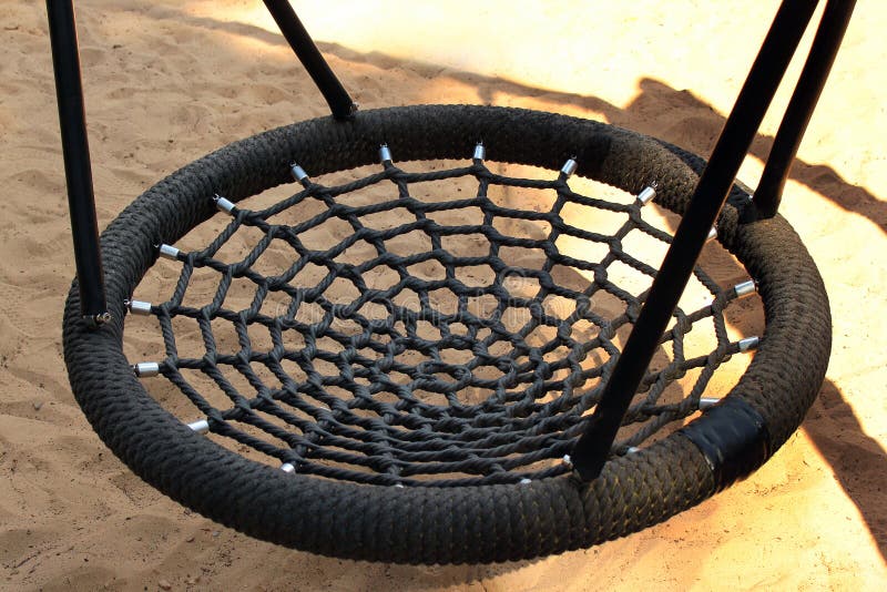 Black Round Woven Rope Swing Stock Image - Image of sand, playground ...