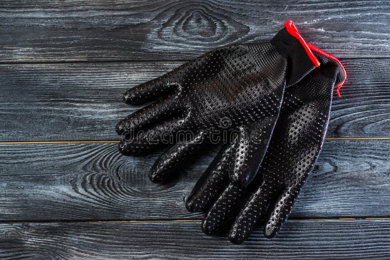 Black Rubberized Gloves for Work Stock Photo - Image of black, hobby ...