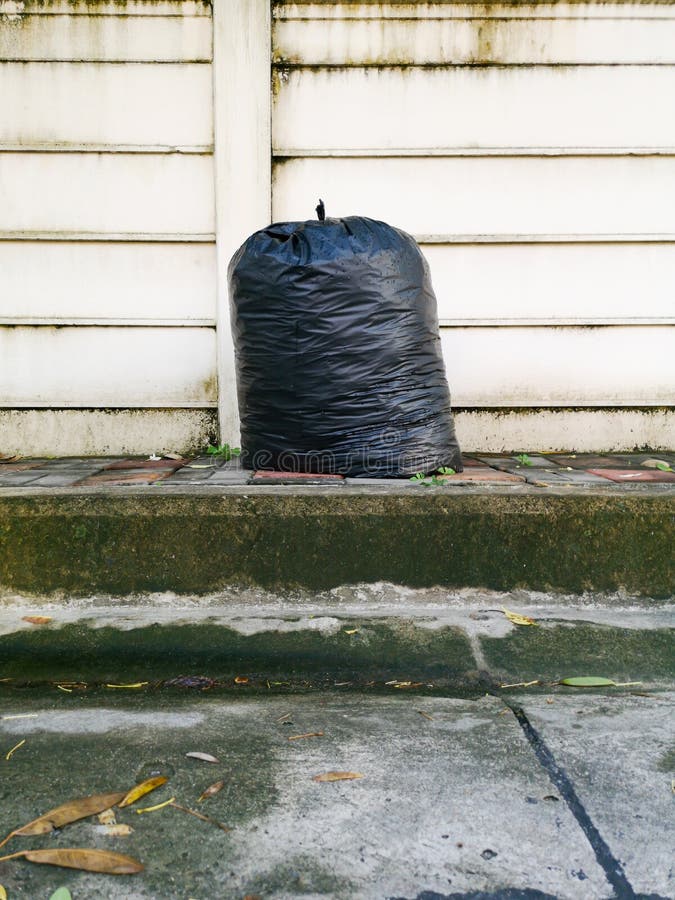 Black Rubbish Garbage on House Wall Stock Image - Image of pack, litter ...