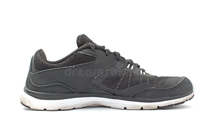 Black Running Shoe Floating in Modern Architectural Setting Stock Photo ...