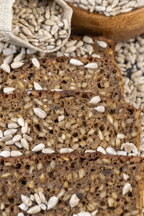 Black Rye Bread Cut into Chunks with Sunflower Seeds Stock Image ...