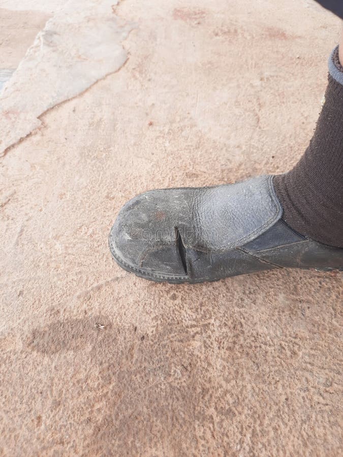 Black Safety Work Shoes that Were Damaged by the Cutting Grinding ...