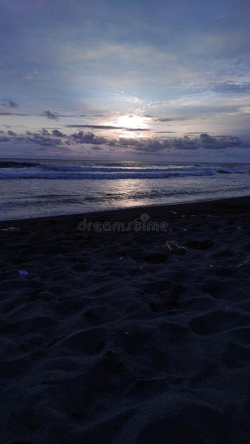 Black Sand Beach on a Sunset Stock Image - Image of black, waiting ...