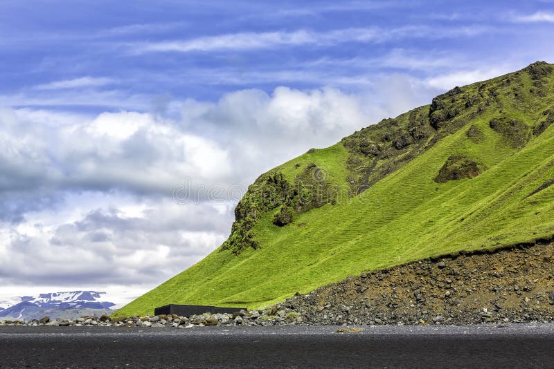 The Black Sand Beach with Typical Icelandic Mountain Stock Image ...