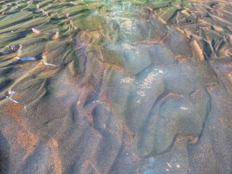 The Black Sand on the River Forms a Unique Texture Stock Photo - Image ...