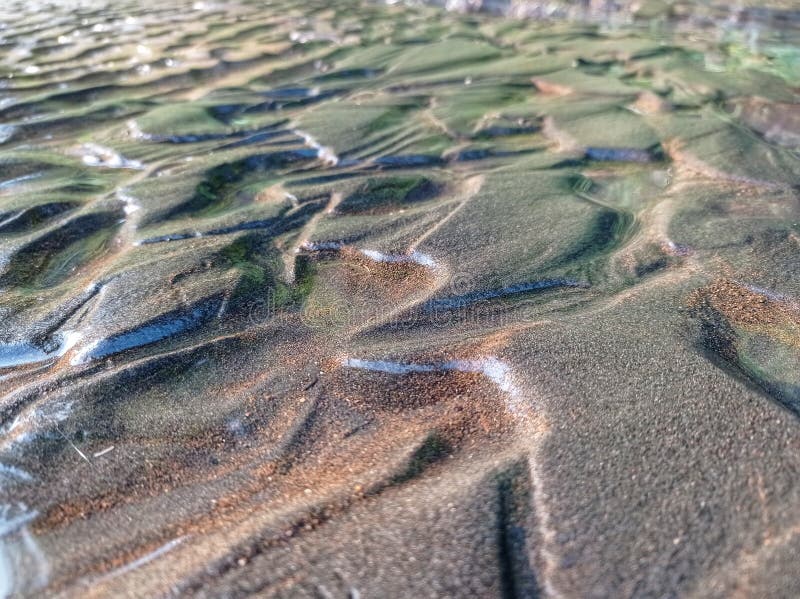 The Black Sand on the River Forms a Unique Texture Stock Photo - Image ...