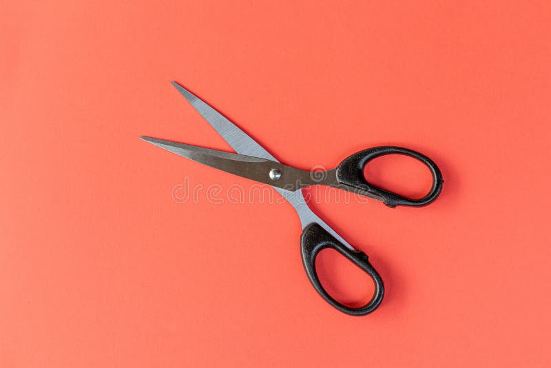 Black Scissors on Blue and Red Color Paper Texture Background. Stock ...