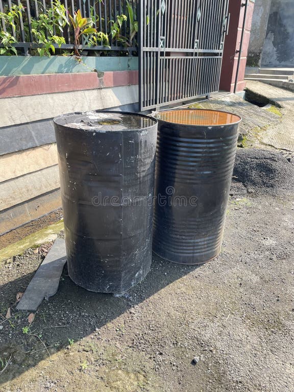 2 black scrap metal drums stock image. Image of tire - 387042587