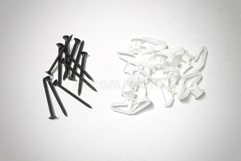 Long Sharp Black Screws and Plastic Fisher for Ceilings or Walls Made ...