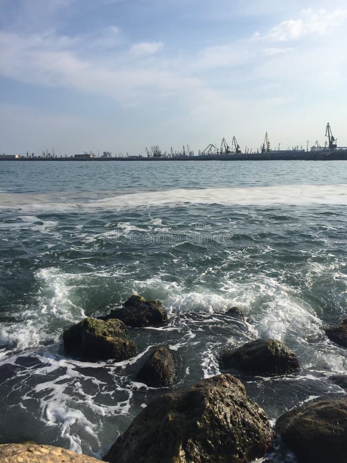 Black Sea on Rocks Next To Harbor Stock Photo - Image of breakwater ...