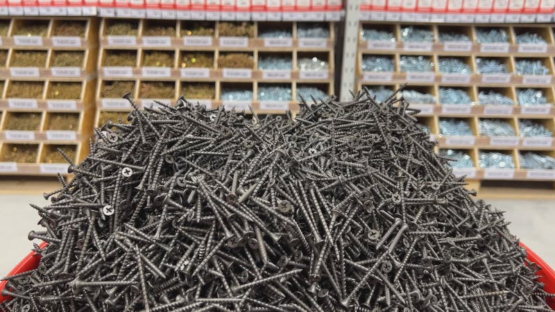 Black Self-tapping Screws in the Store on the Counter. Stock Image ...