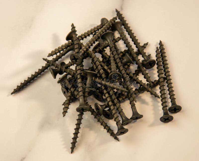 Black Self-tapping Screws for Wood Work, on the Table. Stock Photo ...