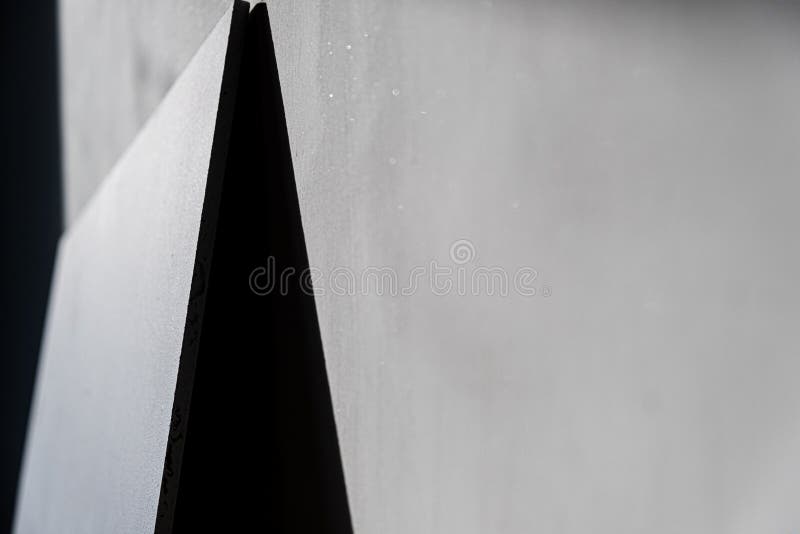 Black Shadow in the Form of a Triangle on a Concrete Wall Stock Photo ...