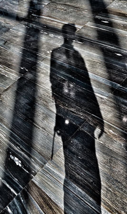 The Shadow of a Man Standing on the Pavement Stock Photo - Image of ...