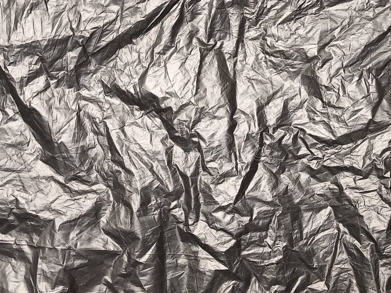 Black Shine Crumpled Plastic for Wallpaper Stock Photo - Image of ...