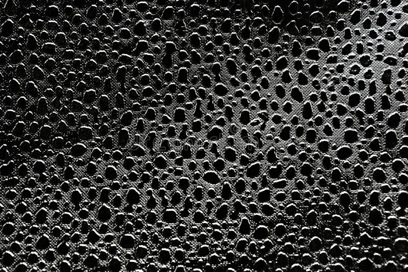 Black Shiny Texture with a Pattern in the Form of Drops Background ...