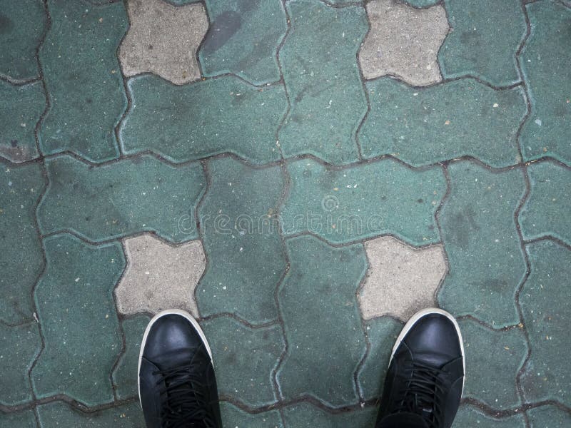 Black Shoes on Concrete Block Background Stock Image - Image of land ...