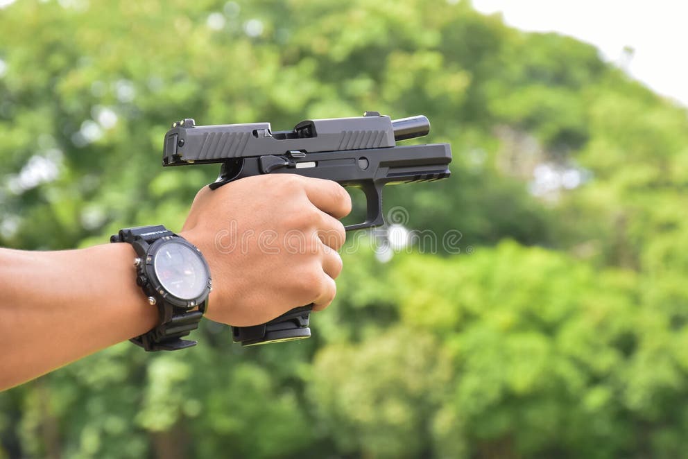 Black Short Shooting Pistol Stock Photo - Image of glass, bandits ...
