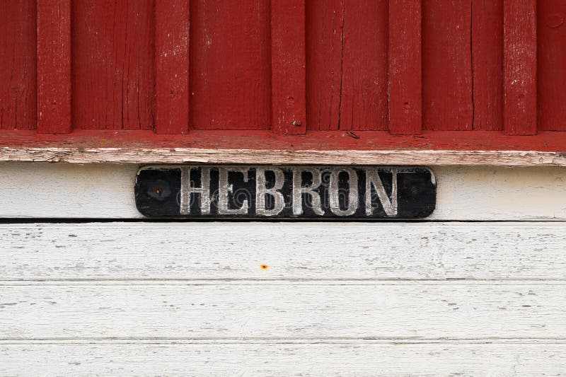 Black Sign Marked Hebron at a Garage.. Stock Image - Image of holy ...