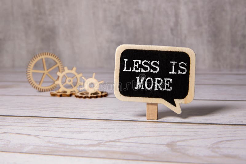 A Black Sign that Says less is MORE Stock Image - Image of motivation ...